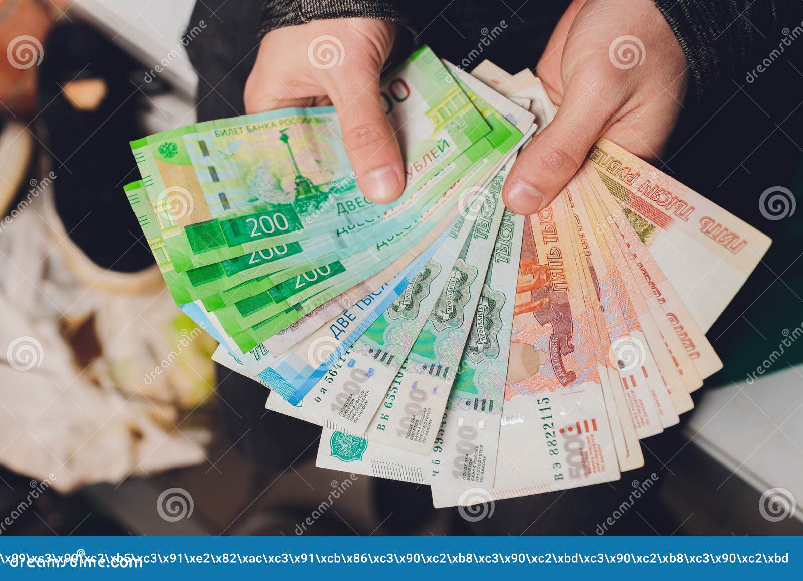 Rubles in Hands. Stack of Money. Black Background. Stock Image - Image ...