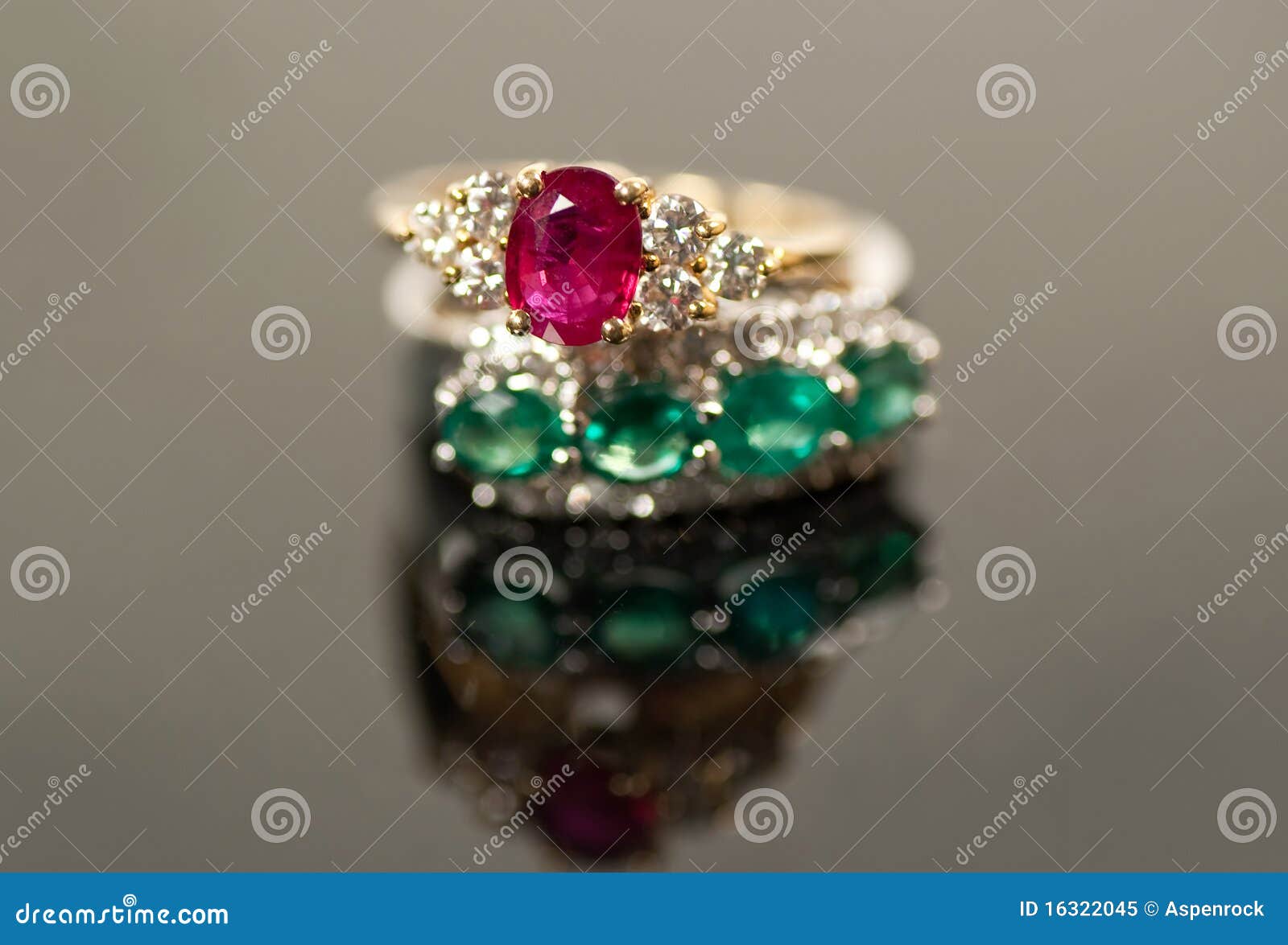 Ruby and Emerald Rings in Diamond Settings Stock Image - Image of white ...