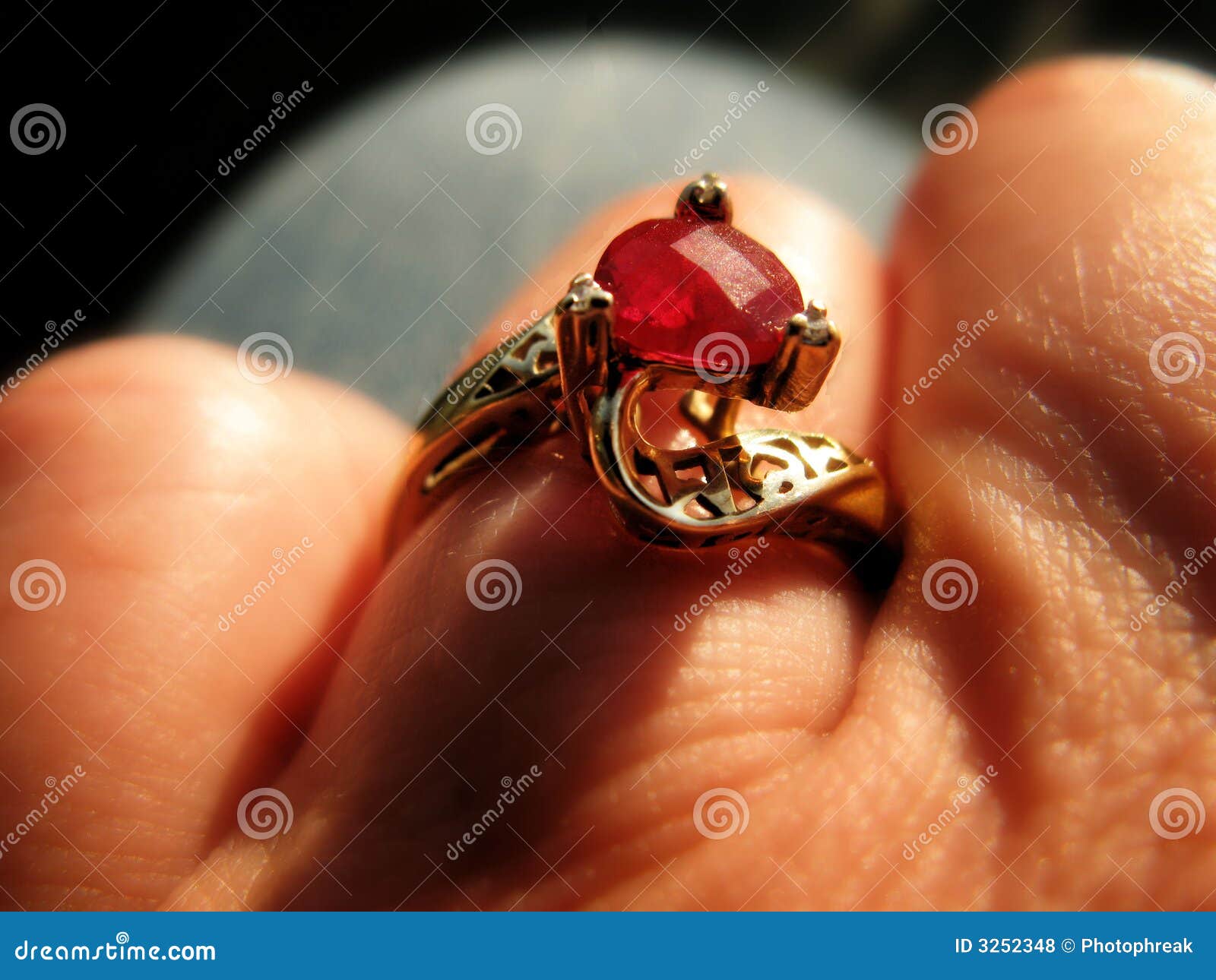 Ruby ring on finger stock photo. Image of love, white - 3252348