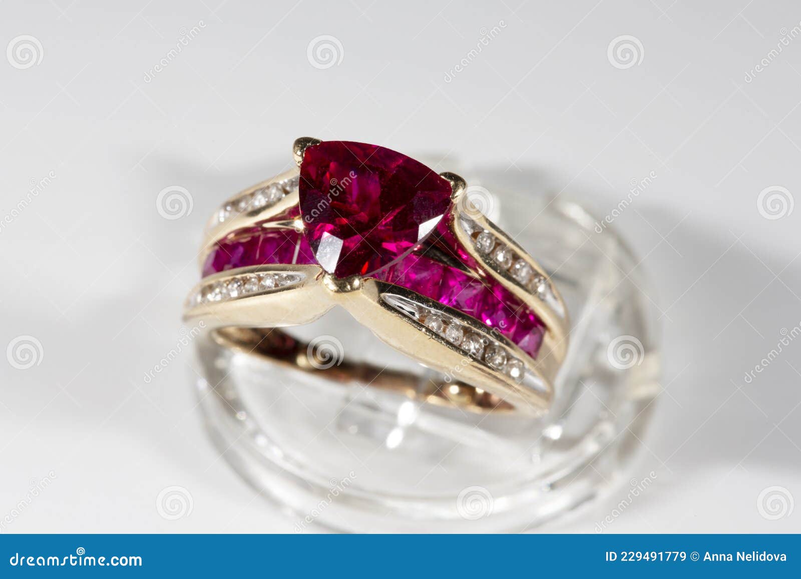 Ruby Ring Surrounded by Diamonds,Trillion Cut, Yellow Gold Ring Stock ...