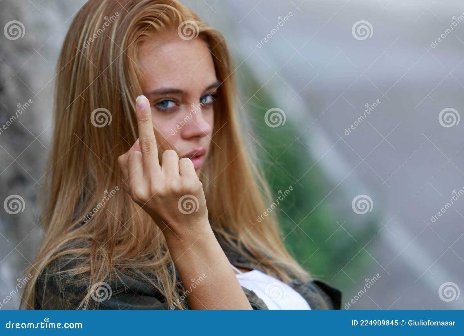 Rude Vindictive Young Woman Giving the Middle Finger Stock Image ... Rude Vindictive Young Woman Giving the Middle Finger Stock Image ...