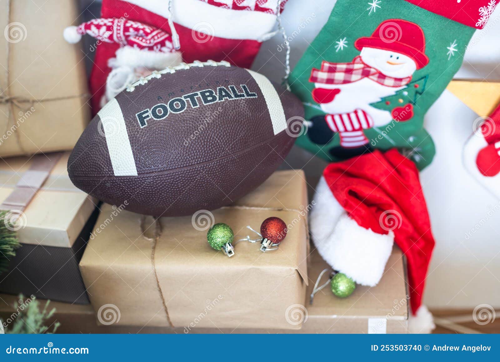A rugby ball for Christmas stock photo. Image of merry - 253503740