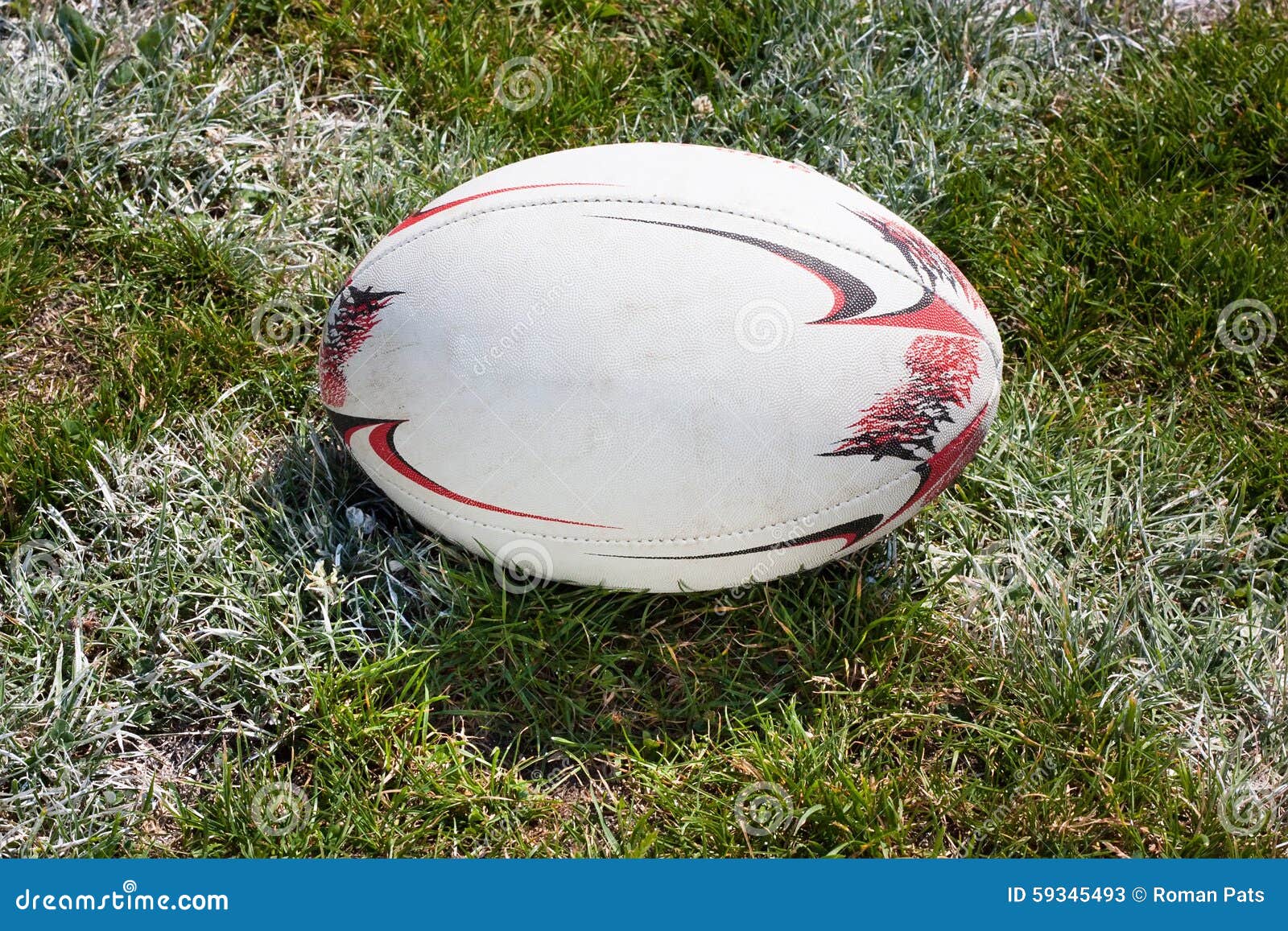 Rugby Ball Lying on the Green Grass Stock Image - Image of oval, field ...