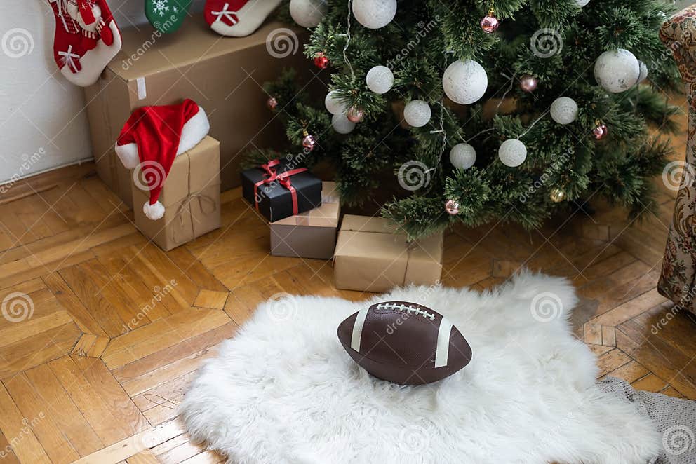 Rugby Ball Under the Christmas Tree Stock Image - Image of present ...