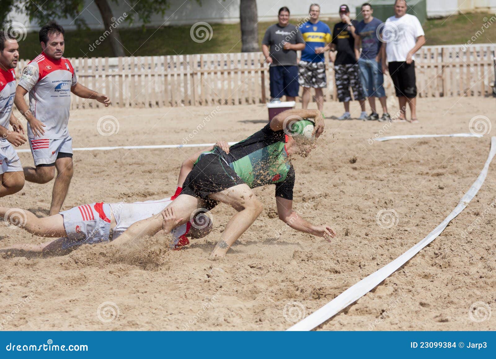 Rugby beach tackle editorial stock image. Image of touchdown - 23099384