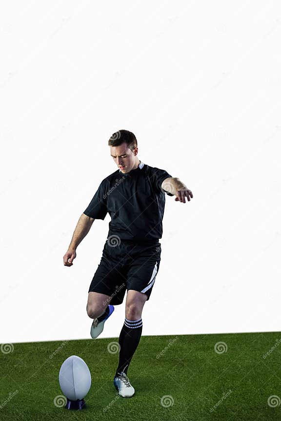 Rugby Player Doing a Drop Kick Stock Image - Image of background ...