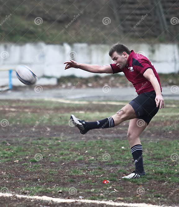 Rugby players in action editorial stock image. Image of huddle - 17263209
