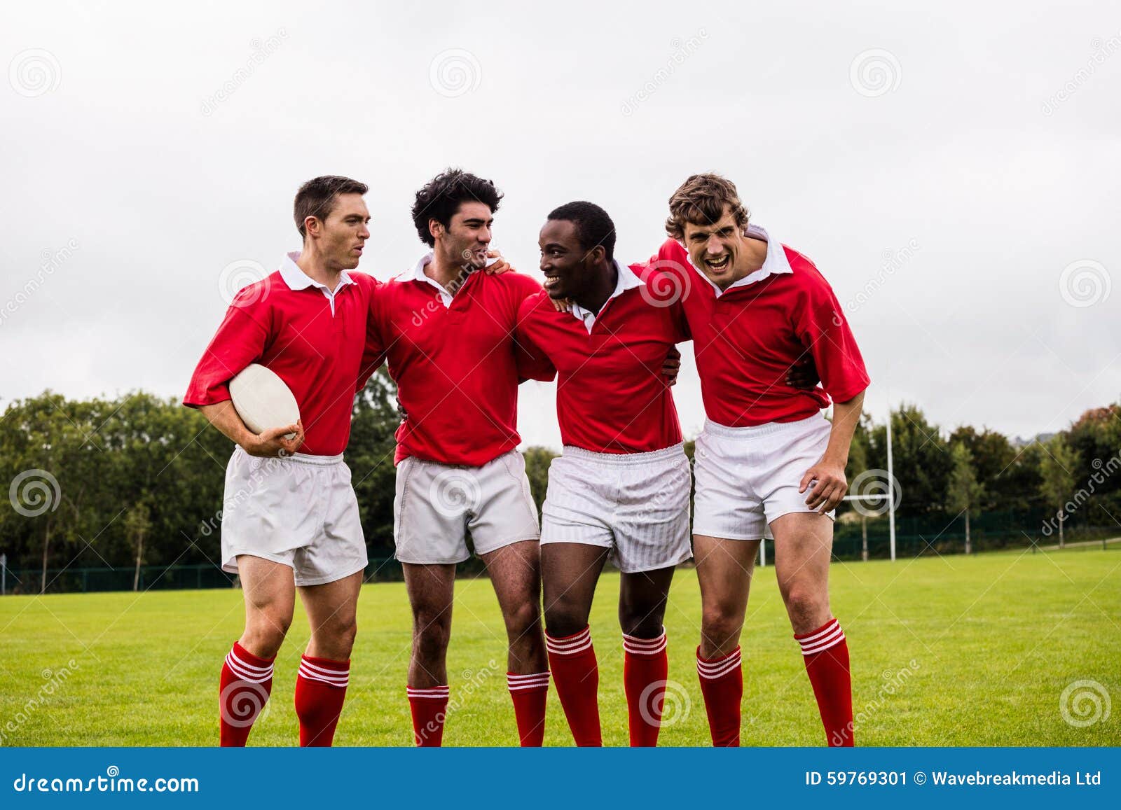 Rugby Players Smiling with Arms Around Stock Image - Image of pitch ...