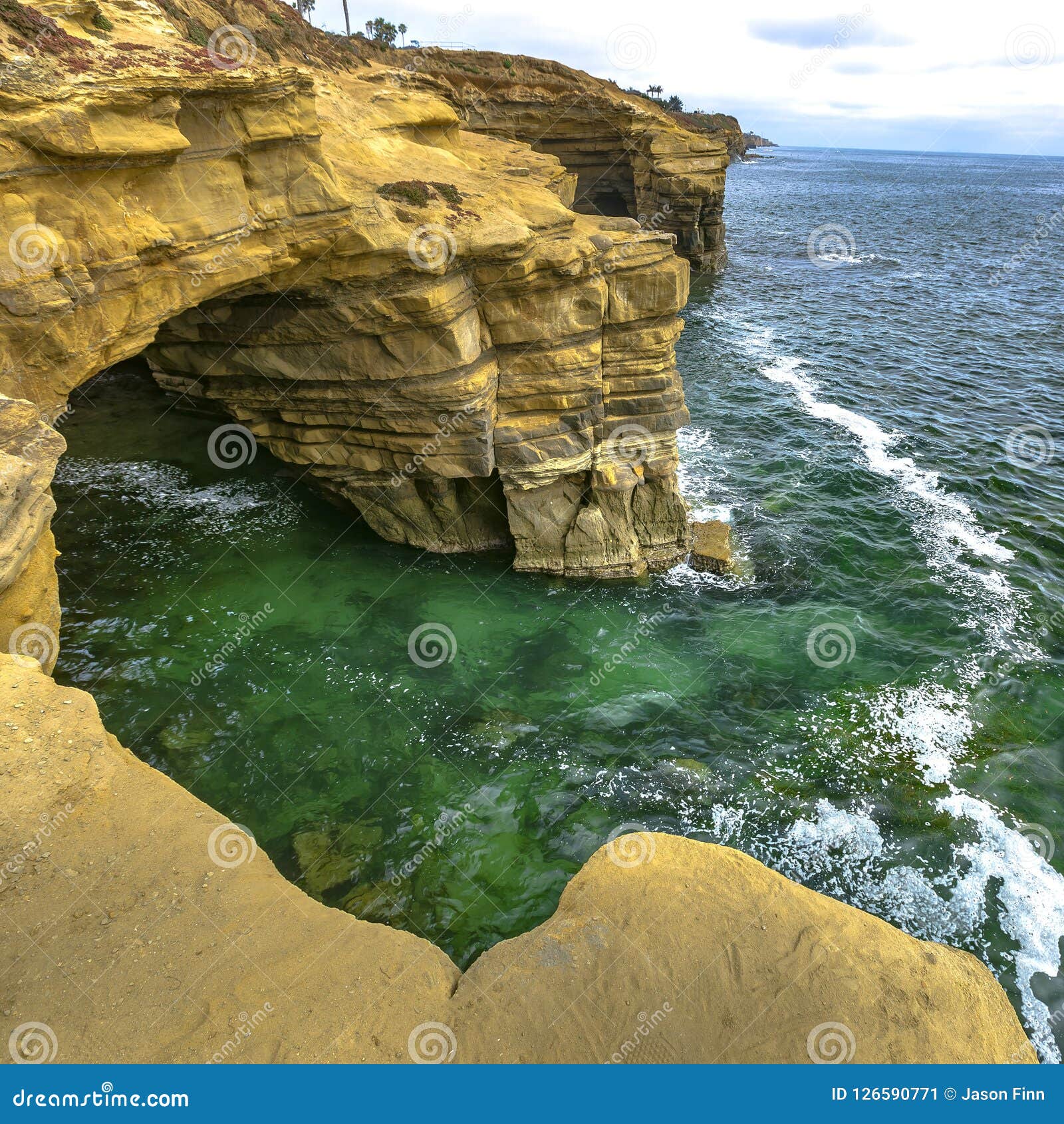 Rugged Cave and Cliff Bordering the Pacific Ocean Stock Image - Image ...