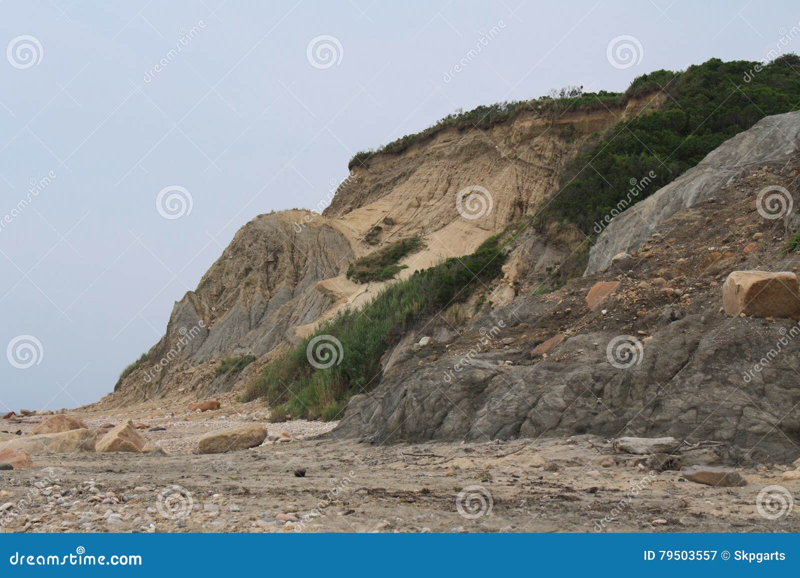 Rugged Cliff Above Coastal Beach Stock Image - Image of rocky, ocean ...