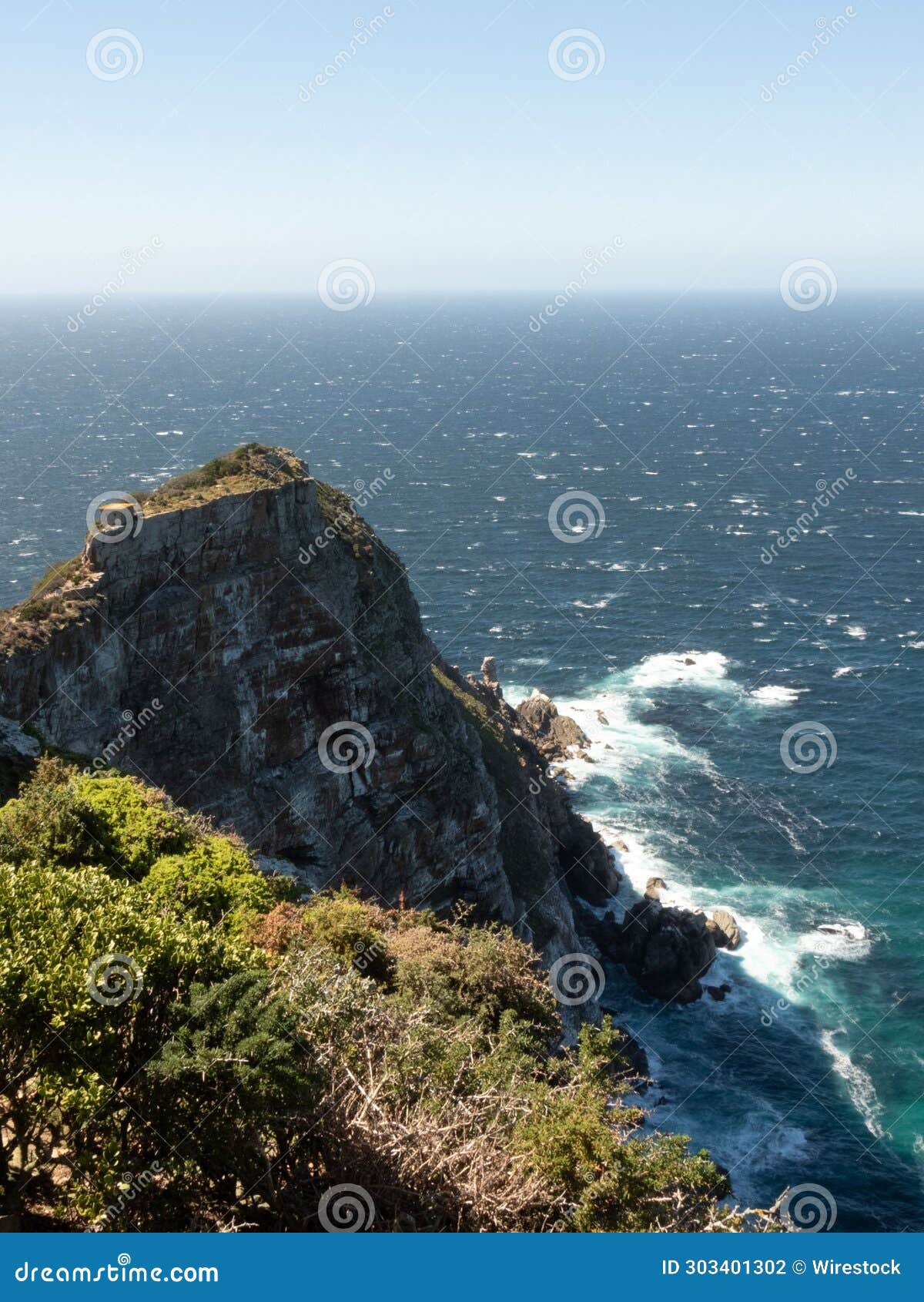 Rugged Cliff Face Overlooking the Vast Expanse of the Ocean. Stock ...