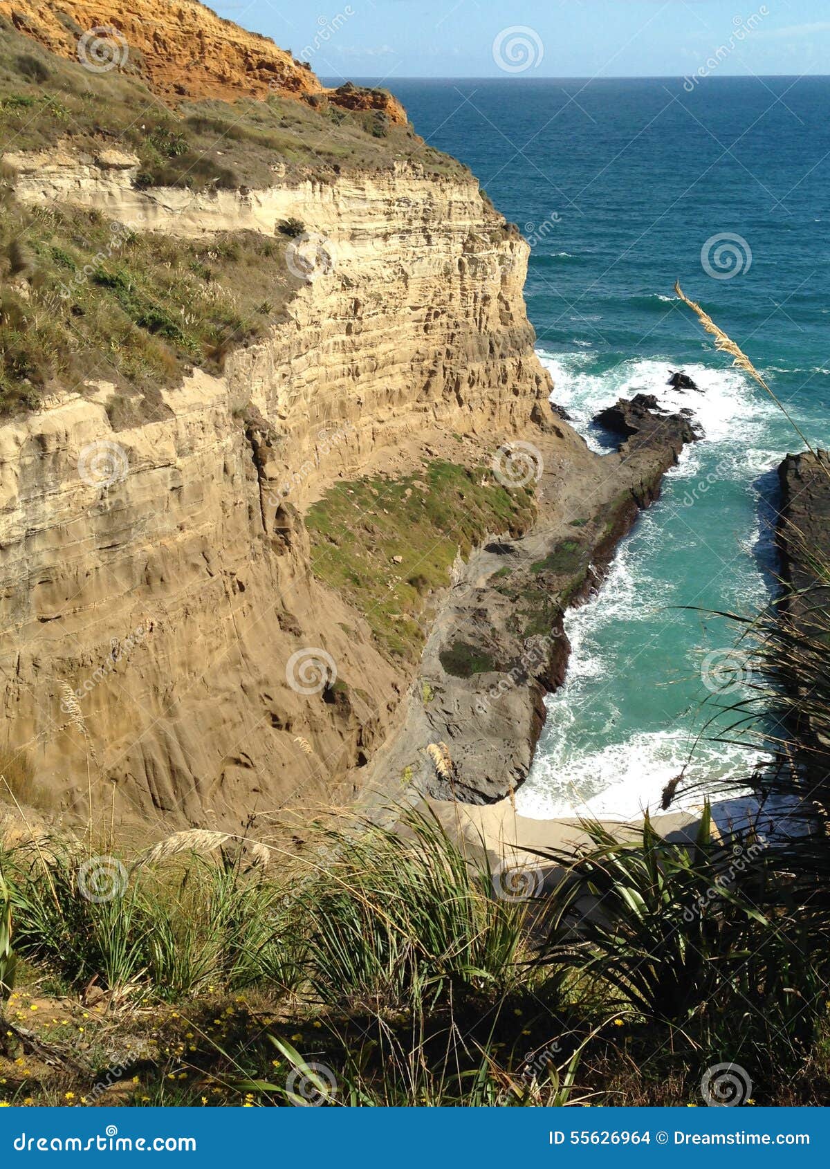Rugged Cliff Top Beach stock photo. Image of beach, inlet - 55626964