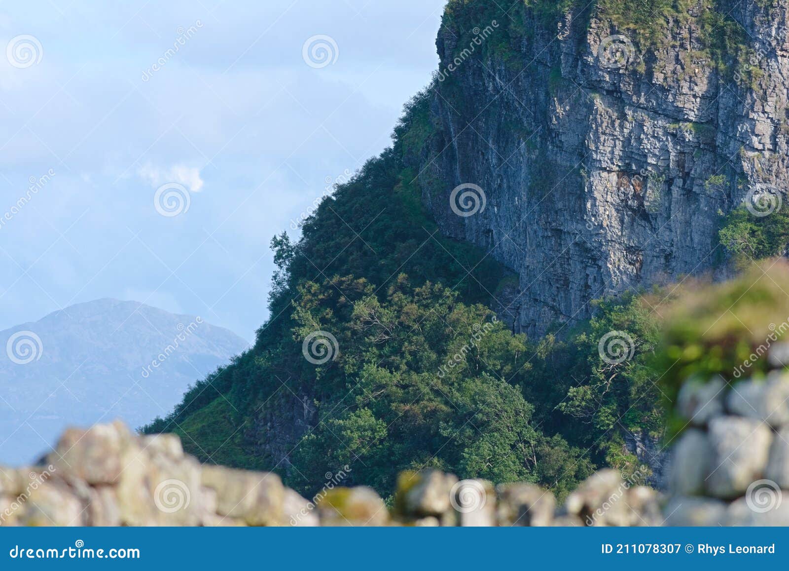 Rugged and Dramatic Cliff Landscape with Blurred Stone Wall Foreground ...