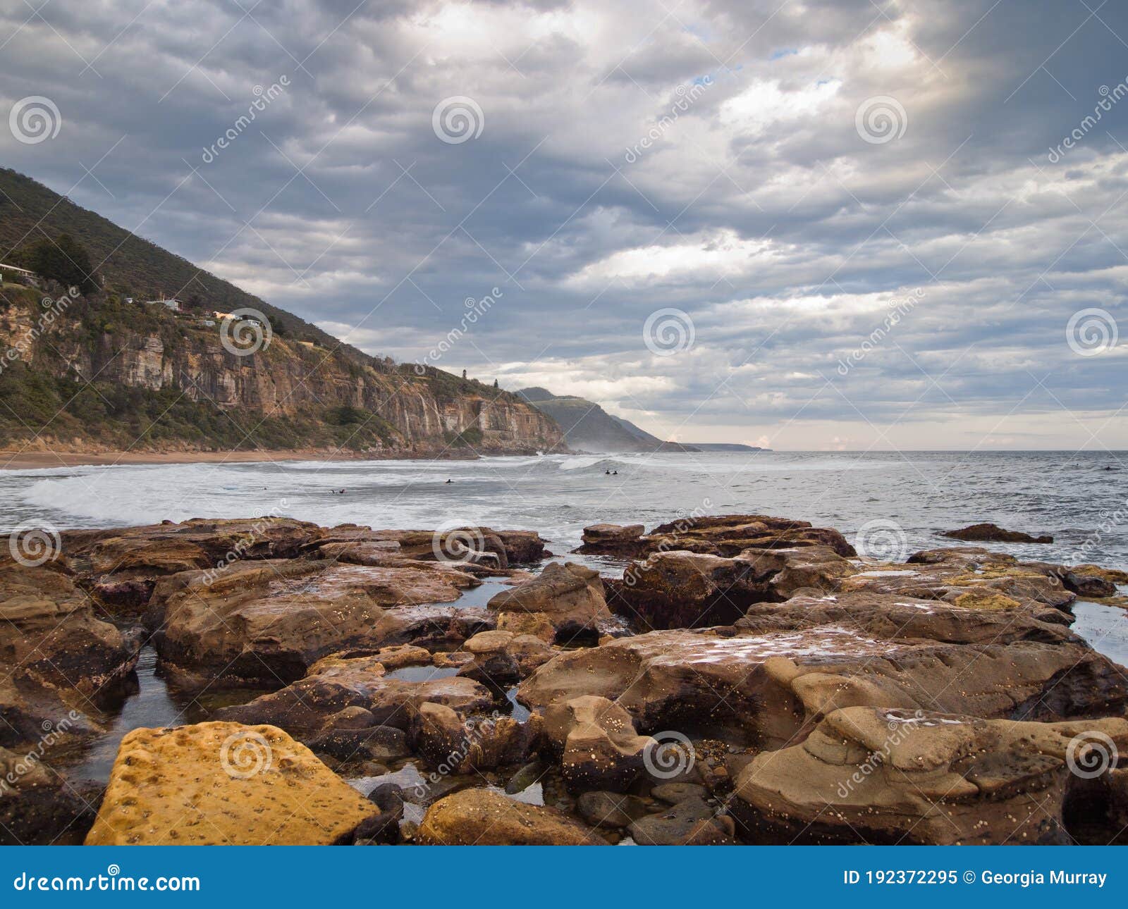 Rugged Dramatic Coastline with Blue Seas and Cliff Faces Stock Image ...