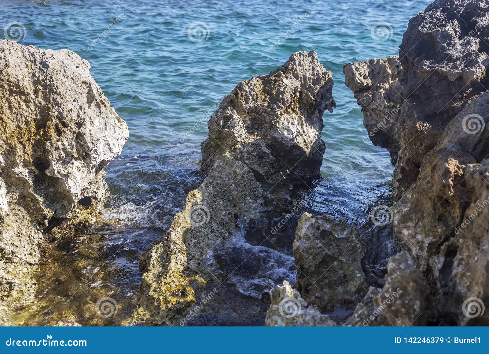 Rugged limestone rocks stock image. Image of mineral - 142246379
