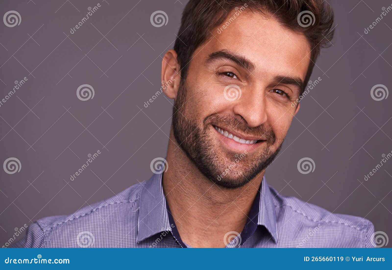 Rugged and Manly. Studio Shot of a Handsome Man Against a Gray ...
