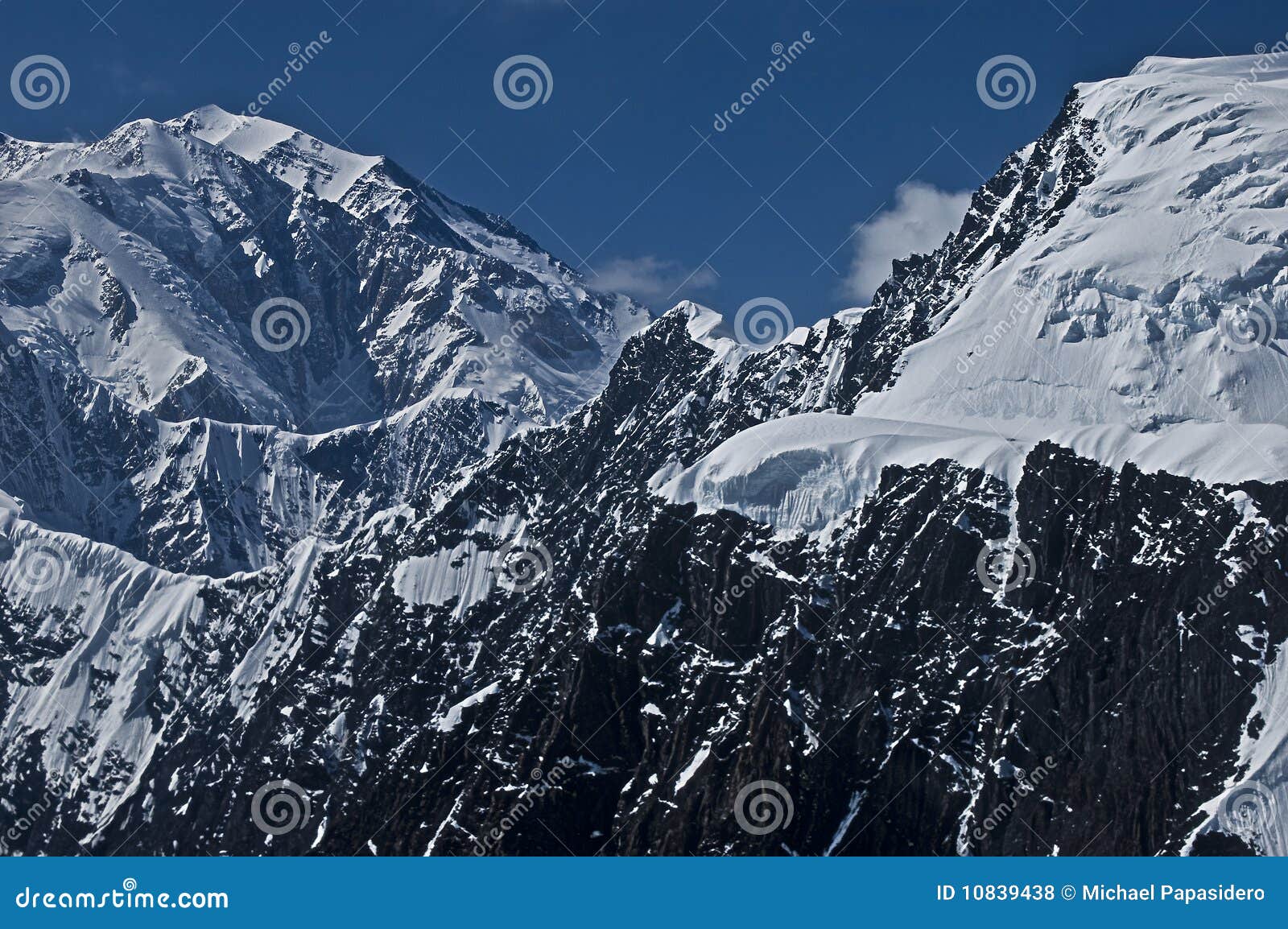 Rugged Mountain and Snow stock photo. Image of cloud - 10839438
