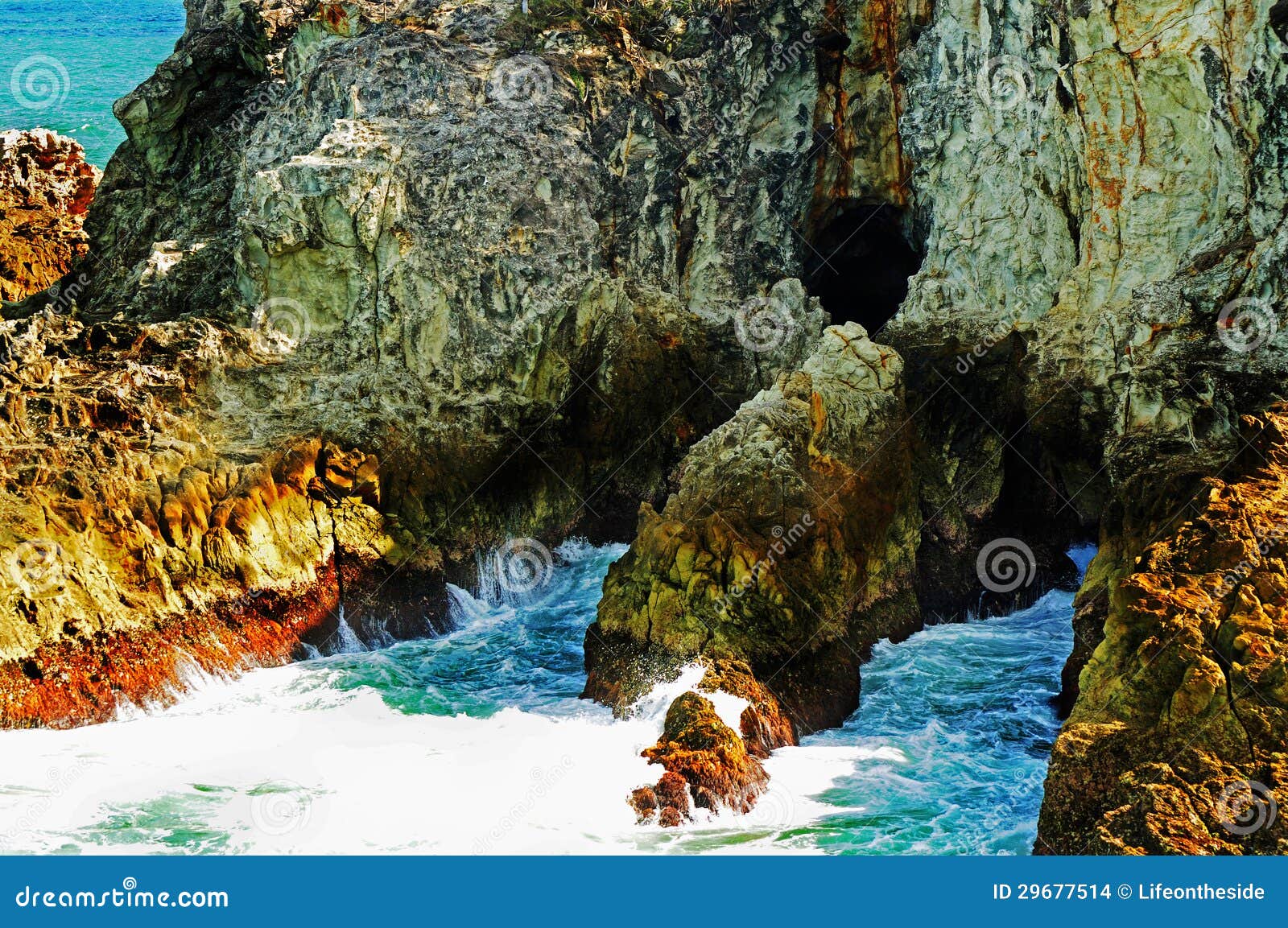 Rugged Rocks & Caves of Tropical Island Cliff Stock Photo - Image of ...