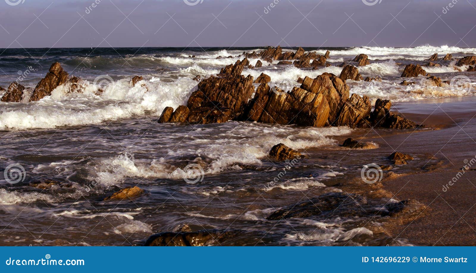 Rugged Rocky Outcrop on an Eastern Cape Beach Stock Image - Image of ...