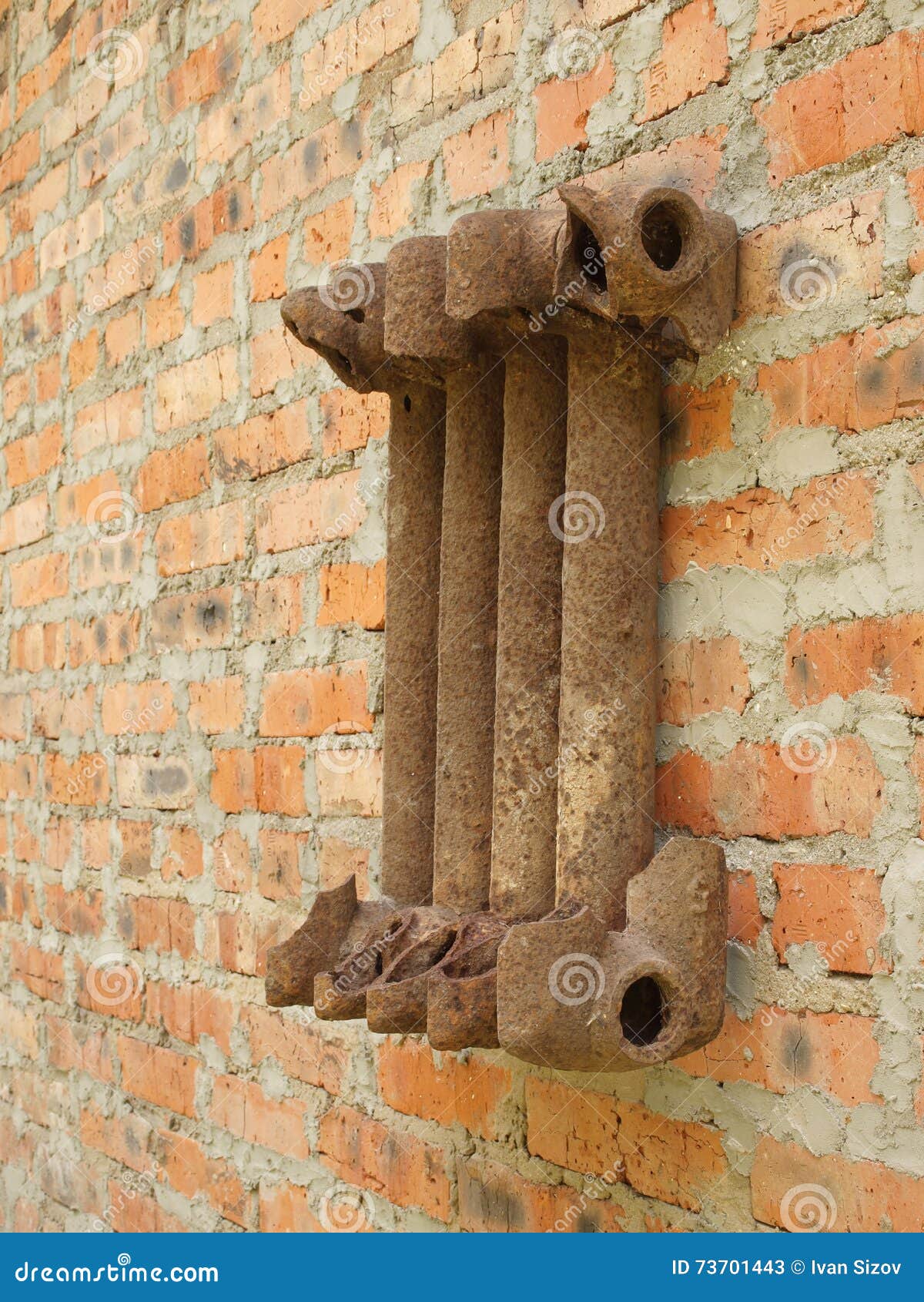 Ruined Cast Iron Radiator for Home on a Brick Wall. Stock Image - Image ...