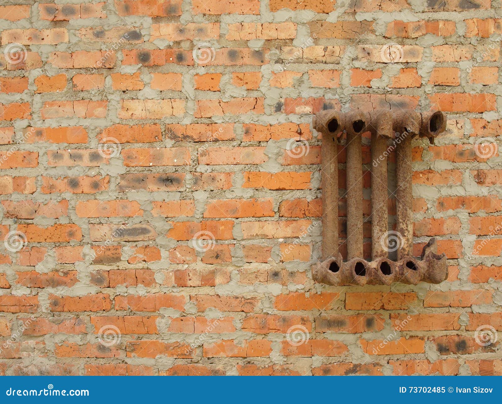 Ruined Cast Iron Radiator for Home on a Brick Wall. Stock Image - Image ...