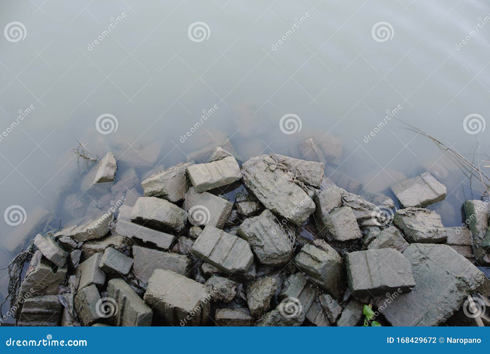 Ruined Rubble in Water Canal Stock Photo - Image of broken, construct ...