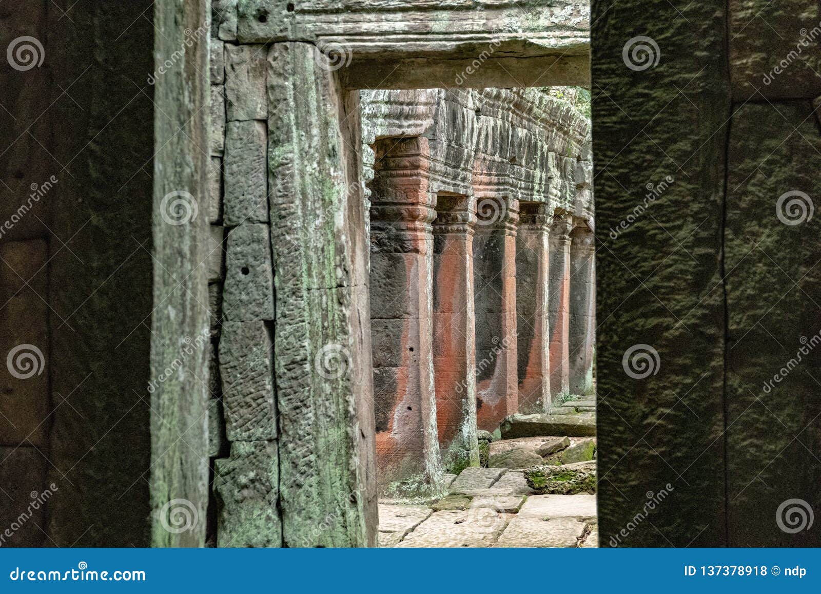 Ruined Temple Colonnade Framed by Twisted Arch Stock Photo - Image of ...