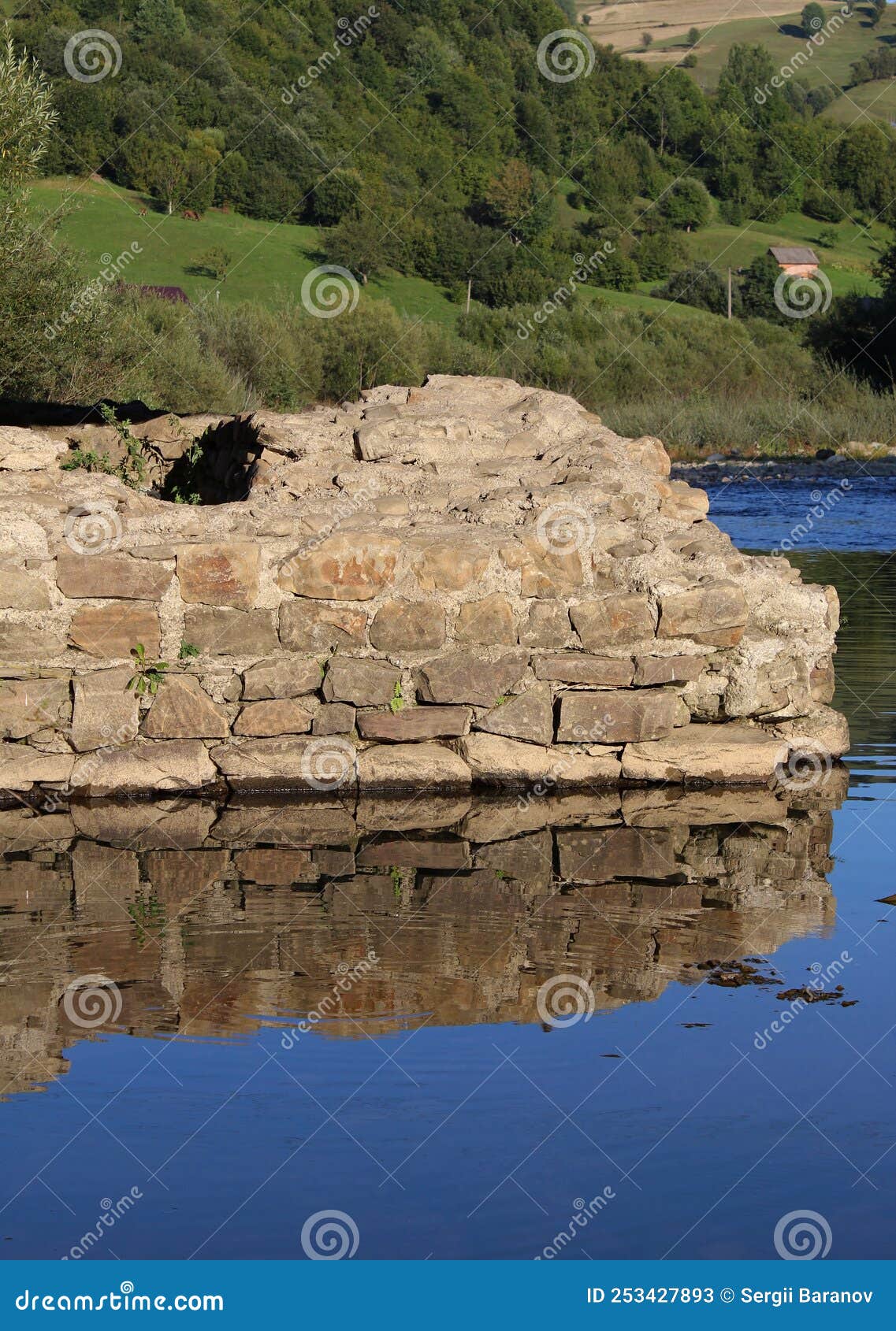 Ancient Pillar of a Stone Bridge Across a River in a Mountainous Area ...