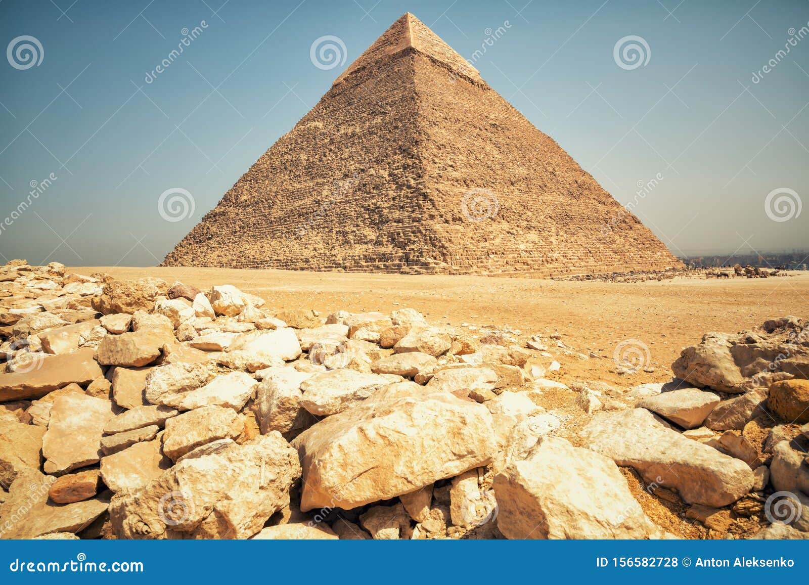 Ruins in Giza Desert and the Pyramid of Chephren, Egypt Stock Photo ...