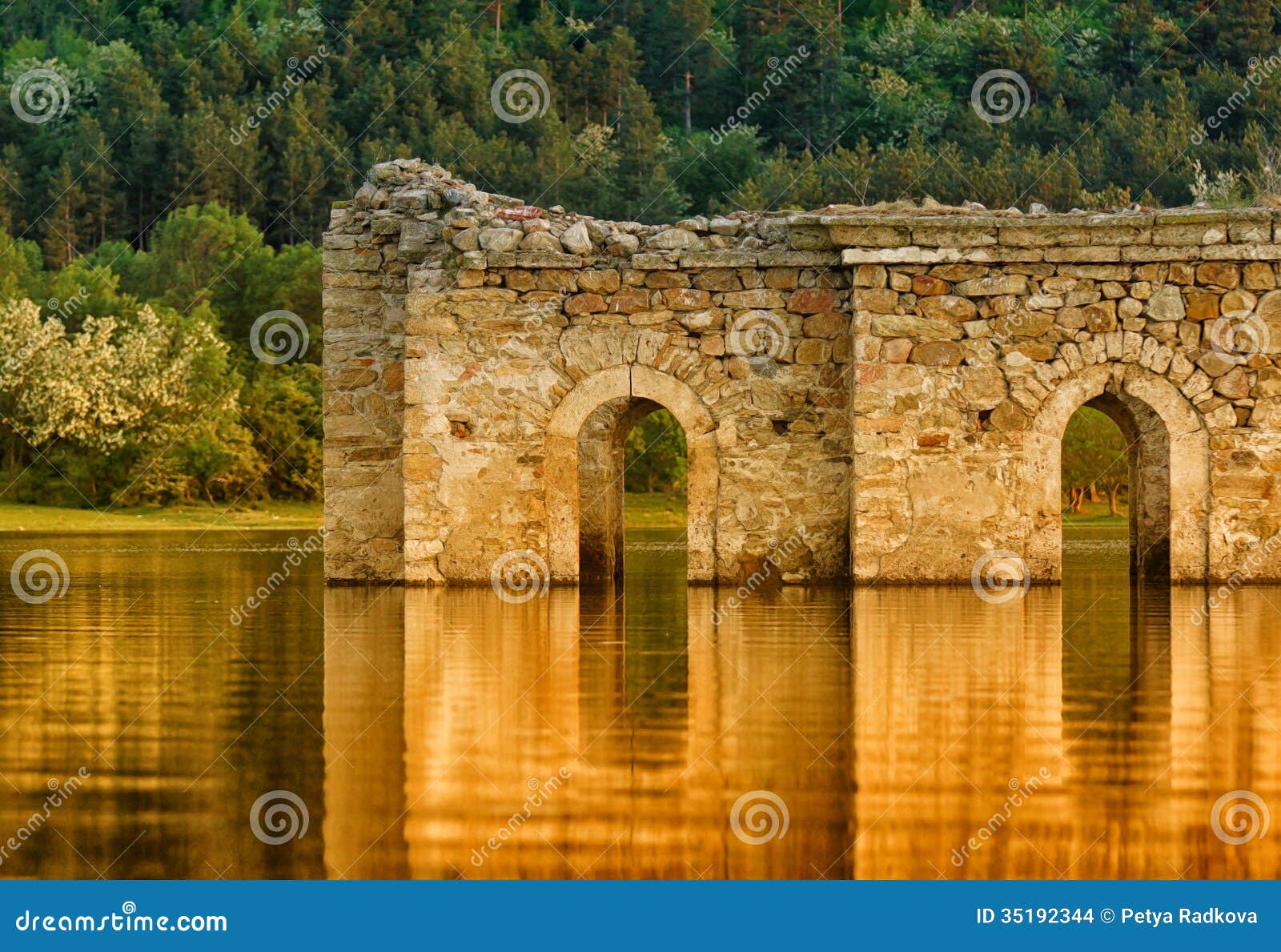 Ruins in the Lake stock photo. Image of sunset, trees - 35192344