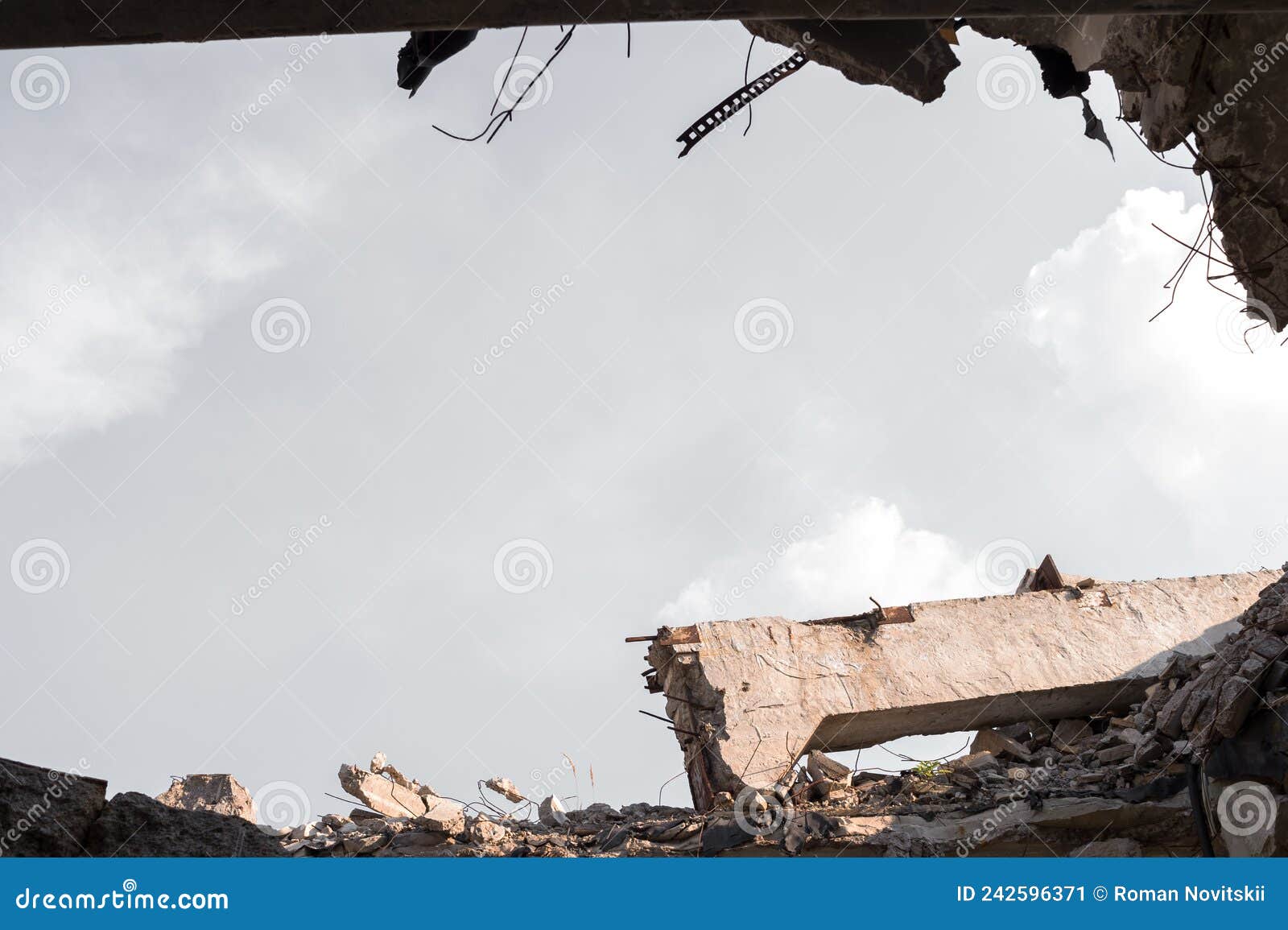 The Ruins of the Remains of a Building with a Concrete Beam Against the ...