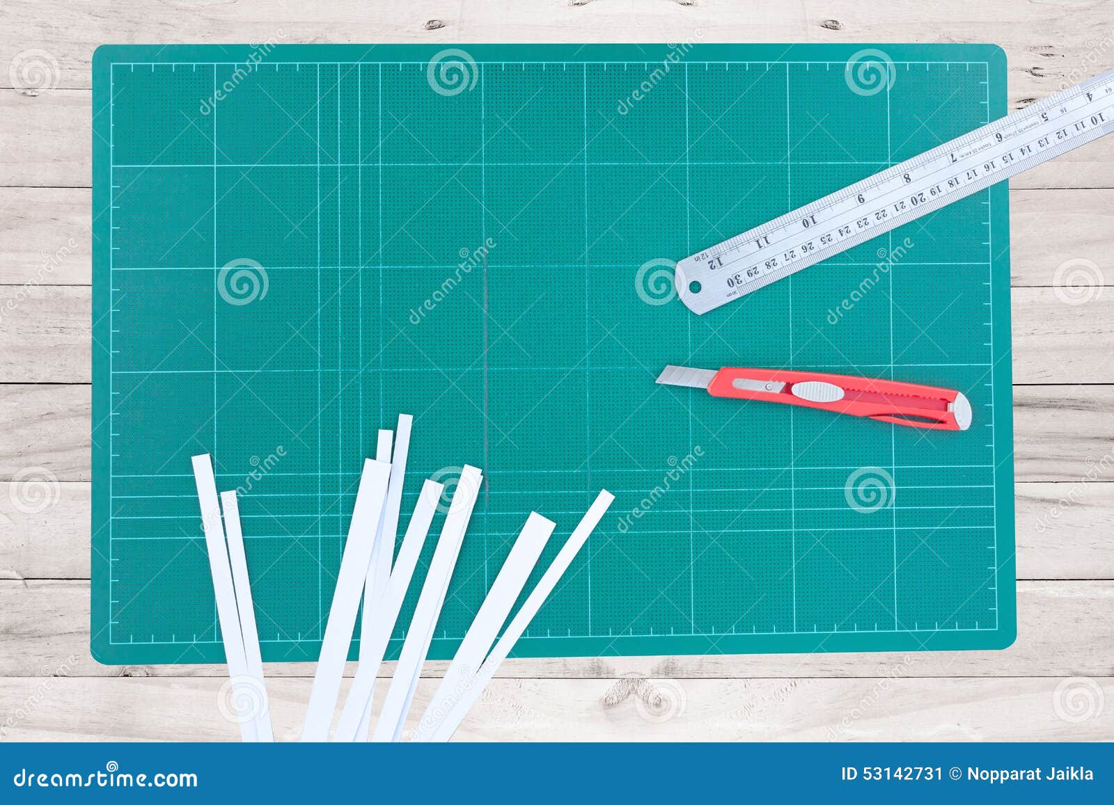 A Ruler and Cutter on Green Cutting Mat Stock Image - Image of ...
