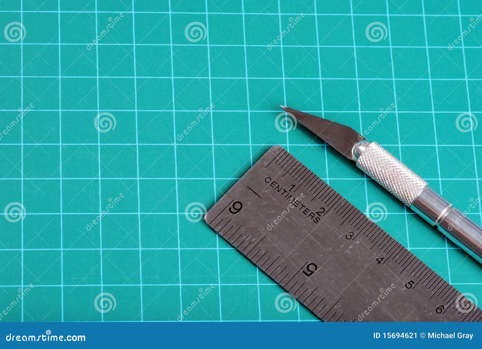 Ruler Knife on a Green Cutting Mat Stock Image - Image of plastic ...