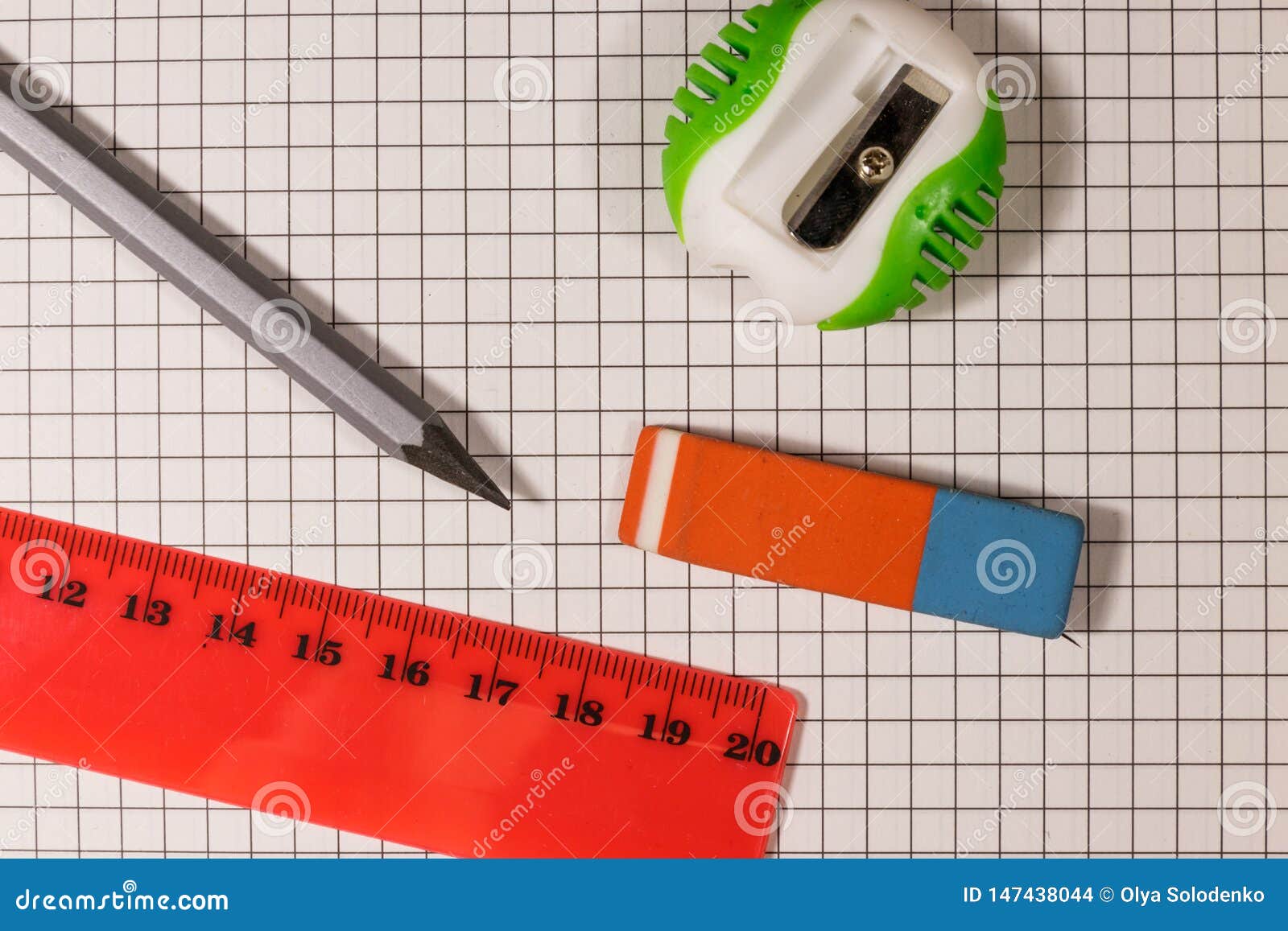 Ruler, Pencil, Sharpener and Eraser on Notepad Sheet Stock Photo ...
