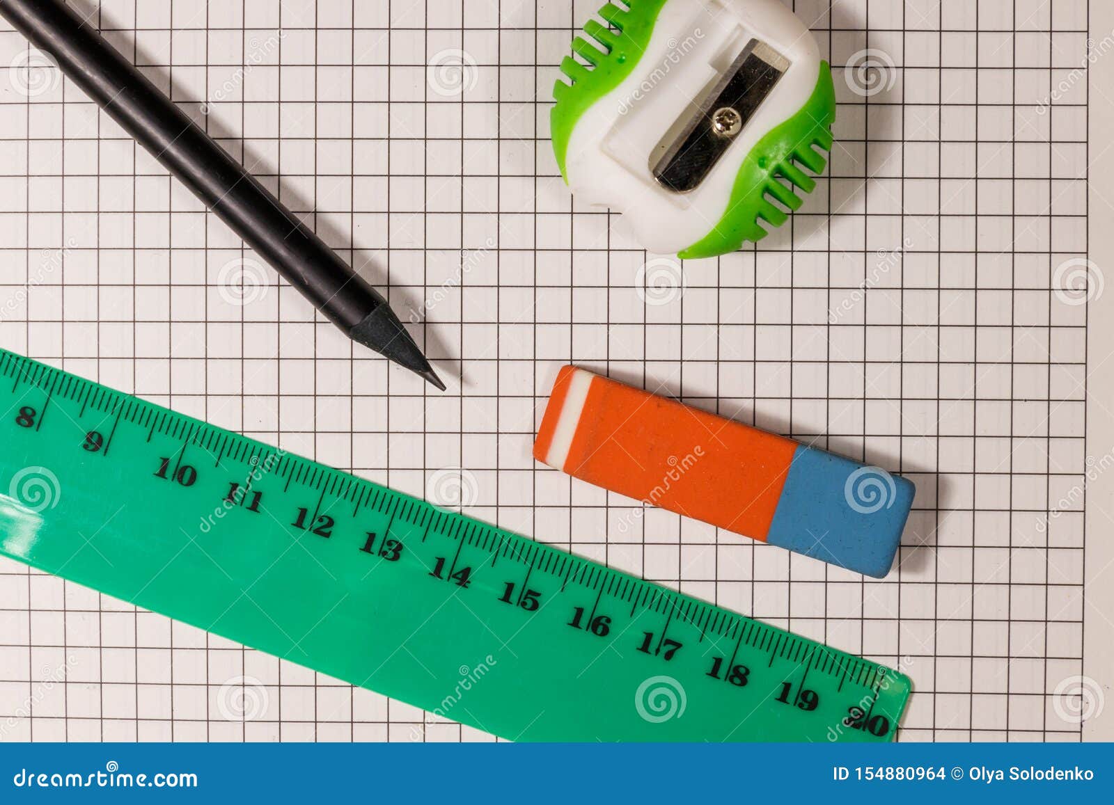 Ruler, Pencil, Sharpener and Eraser on Notepad Sheet Stock Photo ...