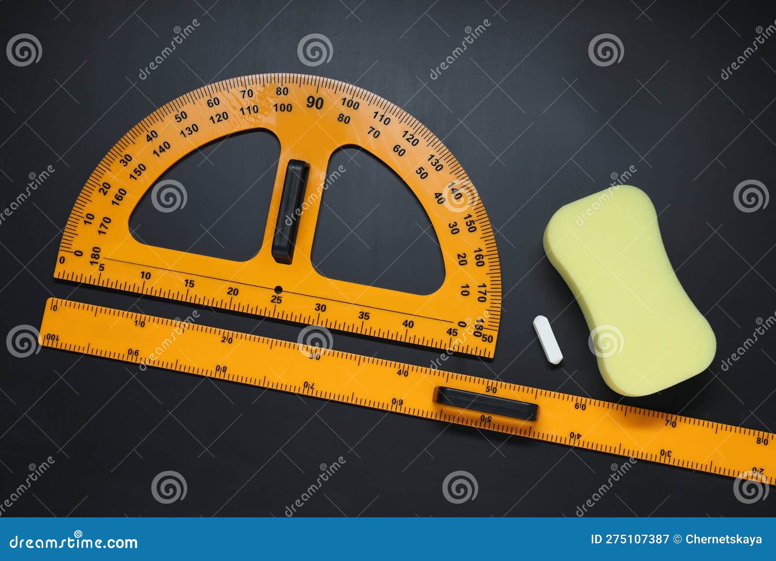 Ruler, Protractor, Chalk and Sponge on Black Table, Flat Lay Stock ...