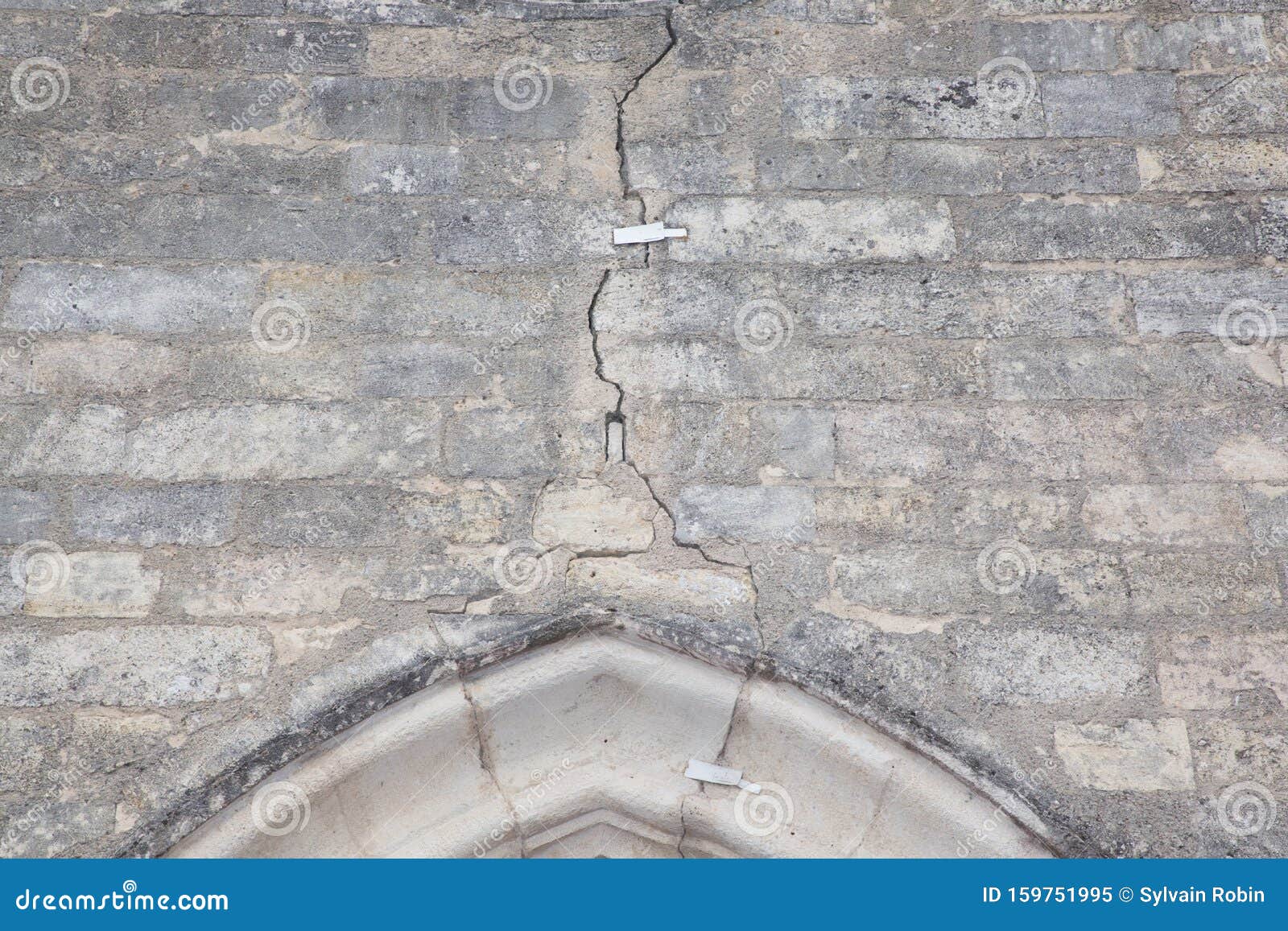 Rulers Measuring the Cracks in Church Wall Stock Image - Image of ...