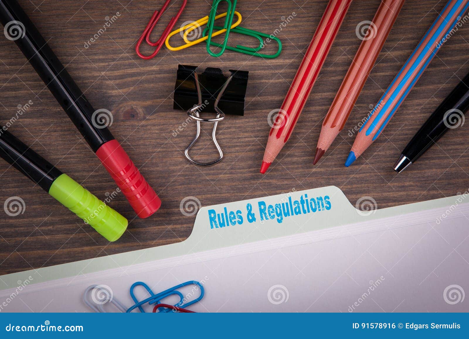Rules and Regulations Concept. Folder Register on a Dark Wooden Desk ...