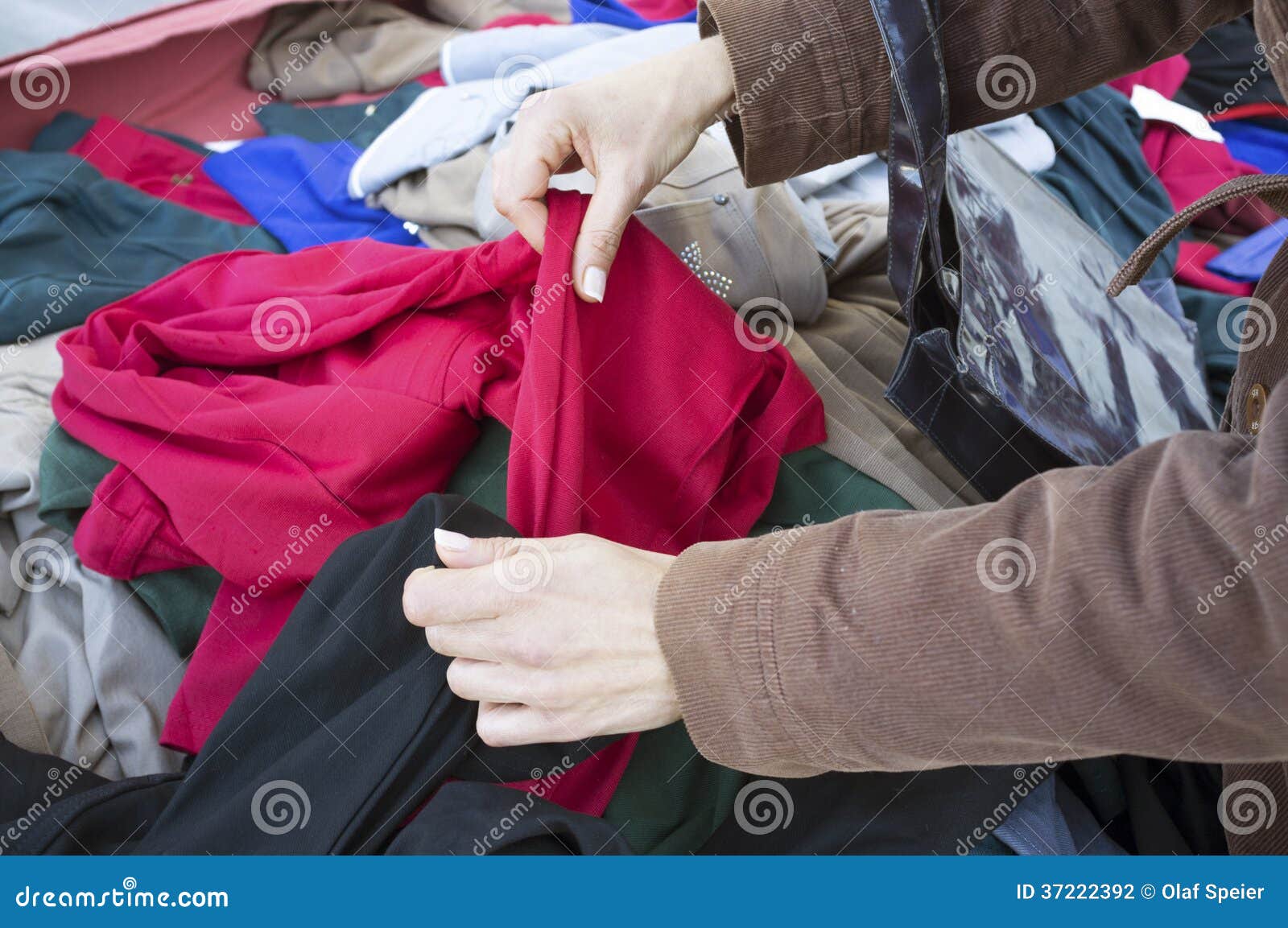 Rummaging on a Clothes Stall Stock Photo - Image of sale, horizontal ...