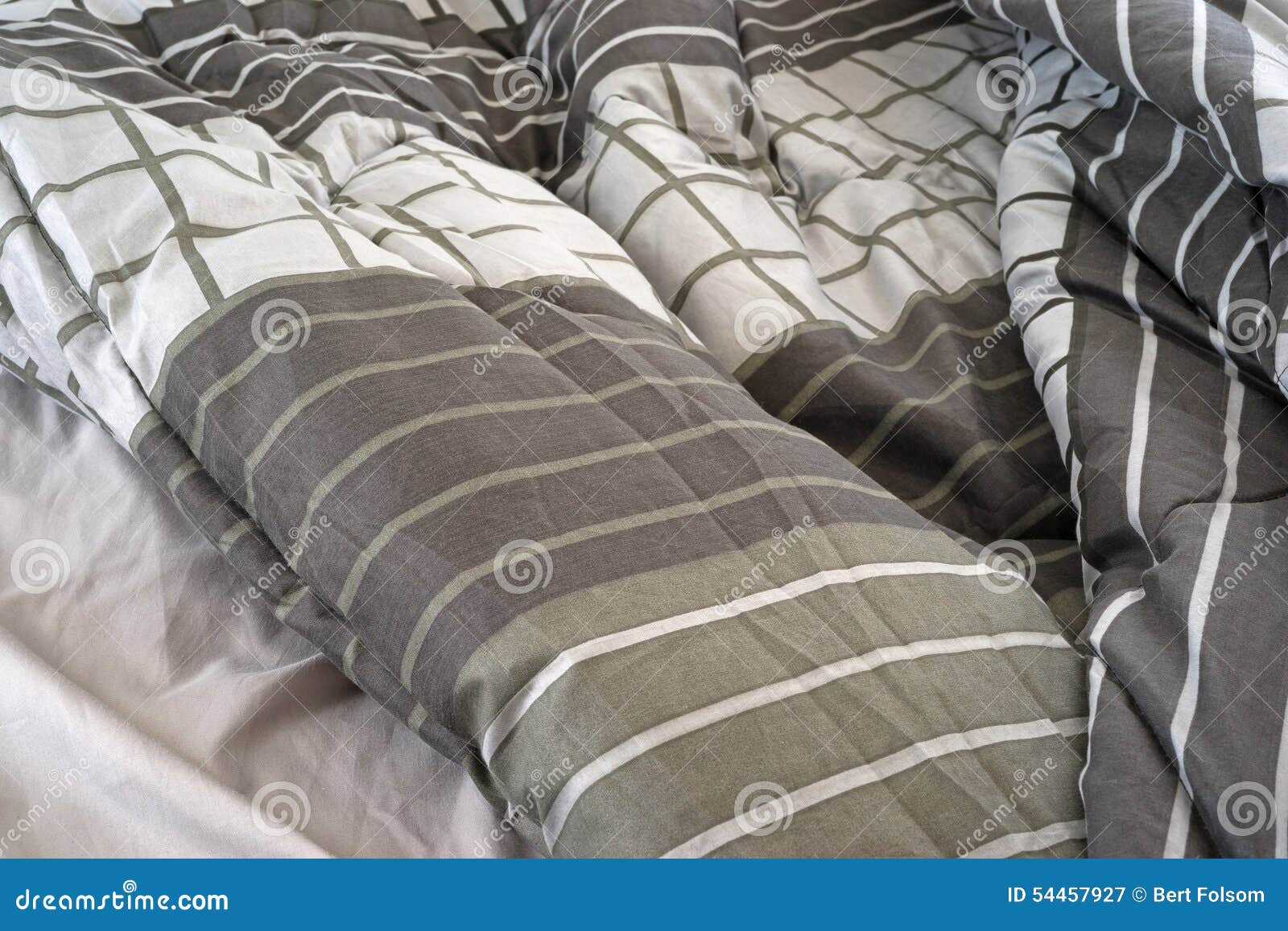 Rumpled Bed Comforter and Sheets Stock Image - Image of creased ...