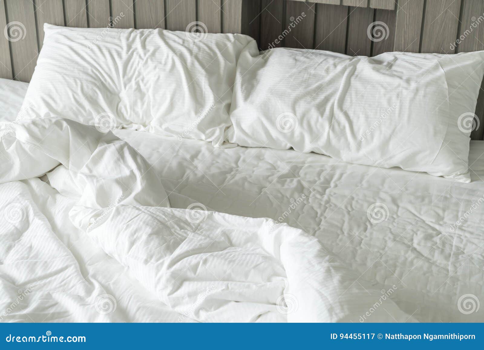 Rumpled Bed with White Messy Pillow Decoration in Bedroom Stock Image ...