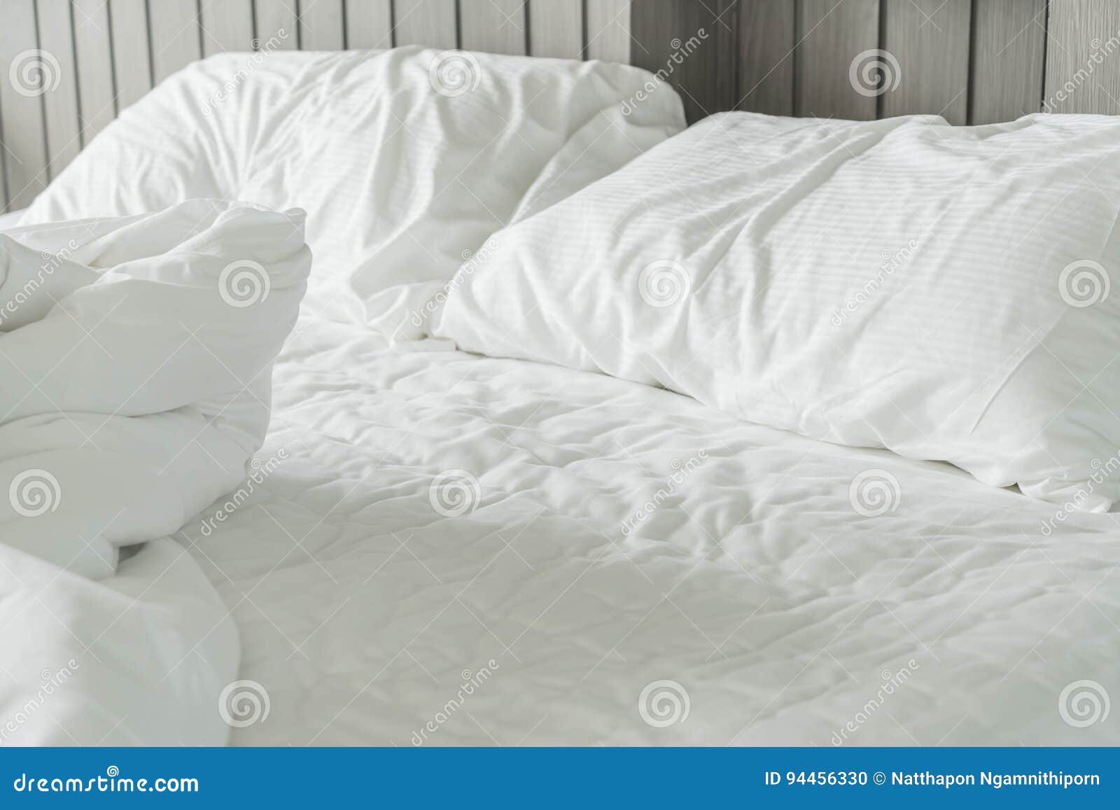 Rumpled Bed with White Messy Pillow Decoration in Bedroom Stock Photo ...