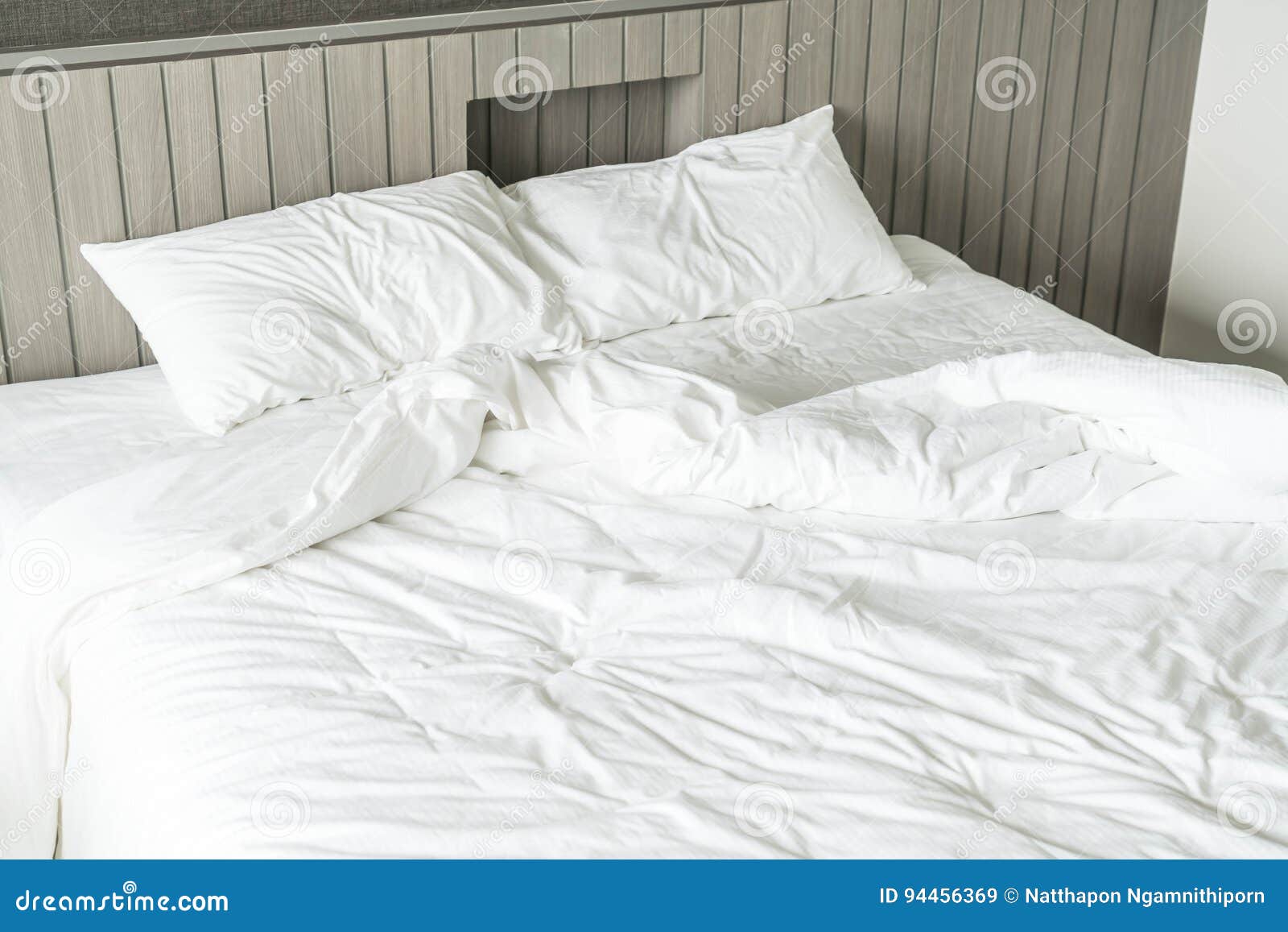 Rumpled Bed with White Messy Pillow Decoration in Bedroom Stock Image ...