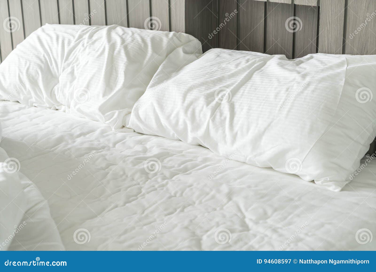 Rumpled Bed with White Messy Pillow Decoration in Bedroom Stock Image ...