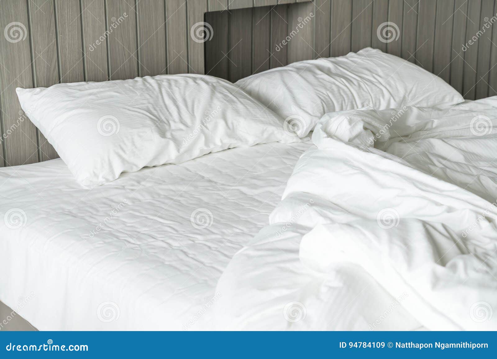 Rumpled Bed with White Messy Pillow Decoration in Bedroom Stock Image ...