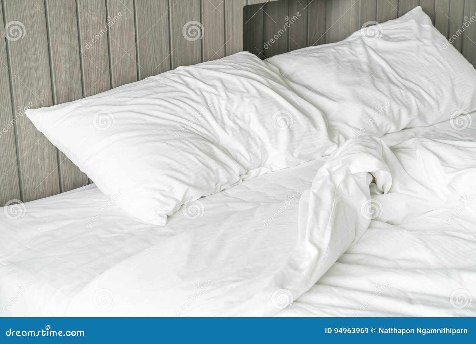 Rumpled Bed with White Messy Pillow Decoration in Bedroom Stock Image ...