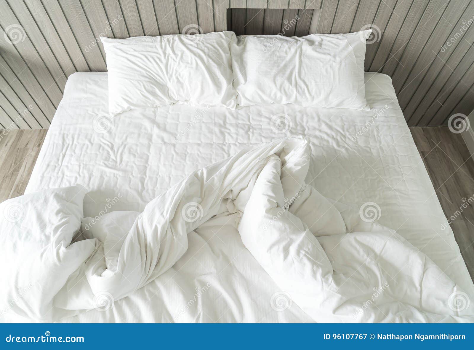 Rumpled Bed with White Messy Pillow Decoration in Bedroom Stock Image ...