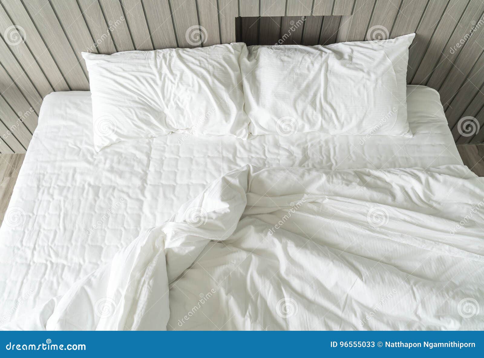 Rumpled Bed with White Messy Pillow Decoration in Bedroom Stock Image ...