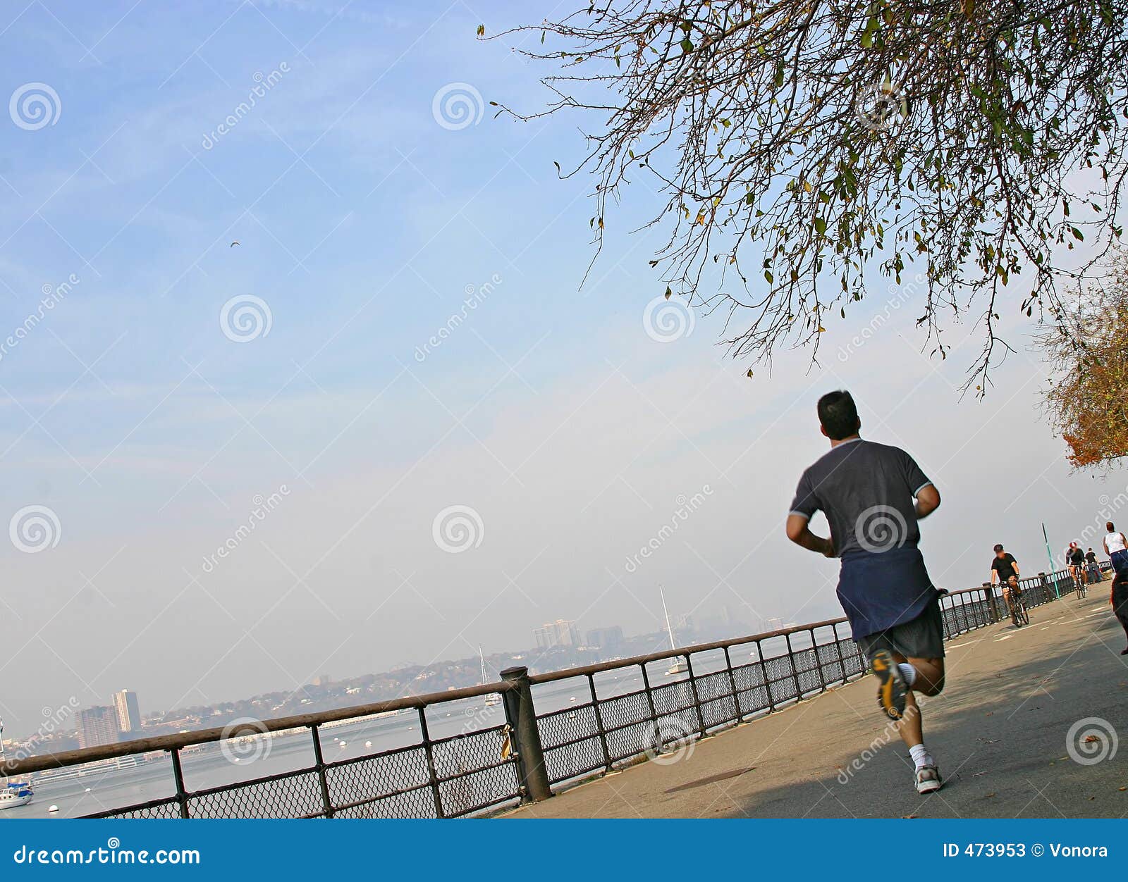 Run along a river stock image. Image of park, fall, boardwalk - 473953