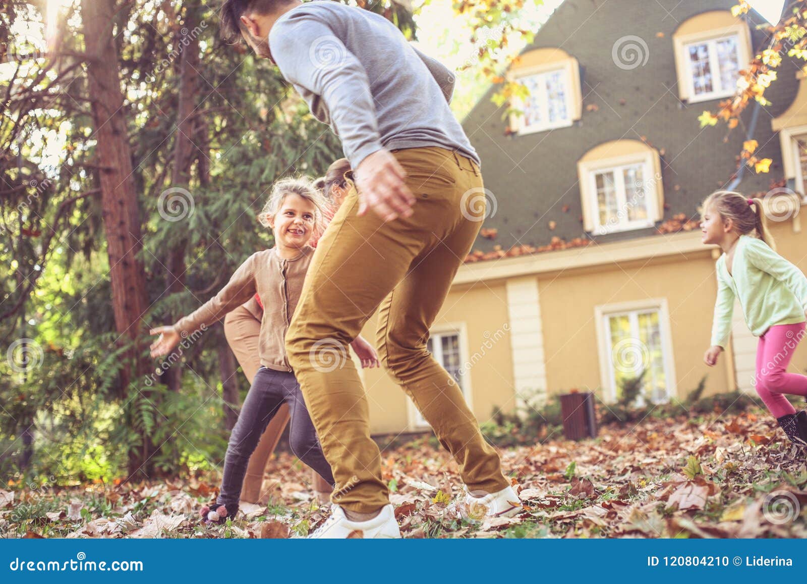Run and Fun with Mom and Dad at Backyard. on the Move Stock Photo ...